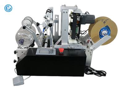 China Máquina de etiquetas semi automática cosmética do alimento para a garrafa redonda com impressora do código à venda