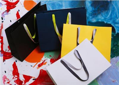 China Fashion Folding Printed Reusable Paper Shopping Bags With Handles for sale