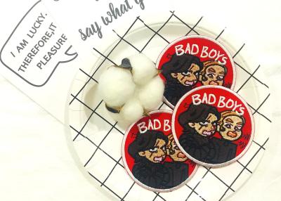 China Round Custom Embroidered Patches With Cute People Pattern And Red Background for sale