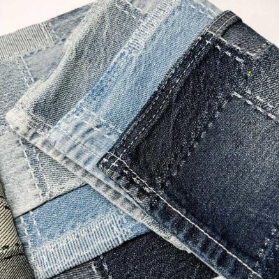 Cina Tessuto di cucitura Jean Material Fabric For Garments del denim del jacquard della grata di miscela del cotone in vendita