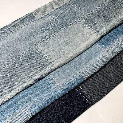 Cina Tessuto di cucitura Jean Material Fabric For Garments del denim del jacquard della grata di miscela del cotone in vendita