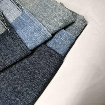 Cina Il cotone 100% con il tessuto trasversale del denim del ringrosso per i jeans 21s ha pettinato densamente il filato in vendita