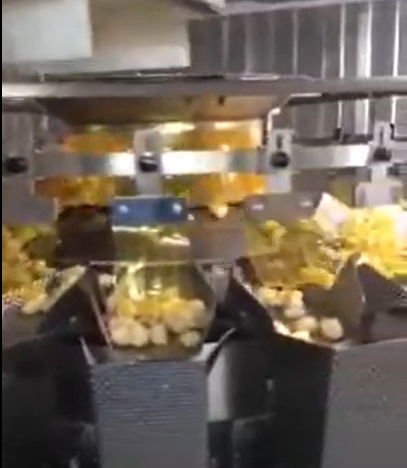 Weigher component of frozen food packing machine