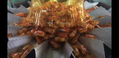 中国 垂直多頭重量袋詰めパンの二次包装機 販売のため