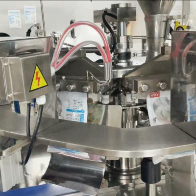 China Food Grade Automatic Vacuum Frozen Food Packing Machine with Multihead Weigher and 5-50 Bag/min Speed for sale
