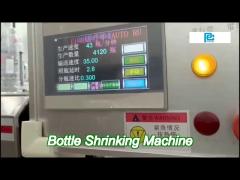 pe round bottle hot air sleeve shrinking machine with bushering sleeve function