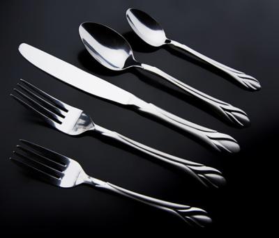 China Fashion design Stainless steel cutlery head in mirror polish and handle in matte finish for sale