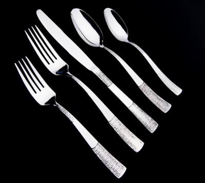 China Fashion design Stainless steel cutlery head in mirror polish and handle in matte finish for sale