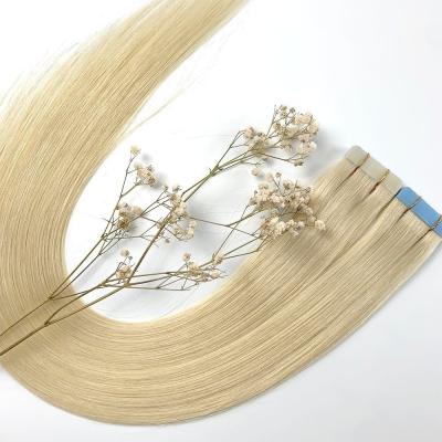 Cina 18 mesi vita capelli umani indiani ondulati con nastro adesivo estensioni di capelli con nastro resistente in vendita