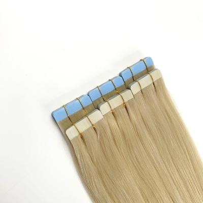 Cina 18 mesi vita capelli umani indiani ondulati con nastro adesivo estensioni di capelli con nastro resistente in vendita