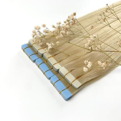 Cina 18 mesi vita capelli umani indiani ondulati con nastro adesivo estensioni di capelli con nastro resistente in vendita