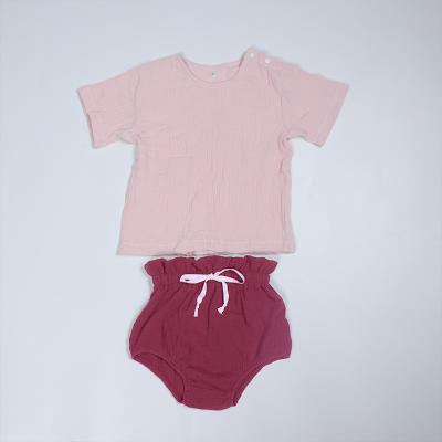 中国 男の子の女の子の新生のロンパースの綿モスリンの綿の不足分の袖 販売のため