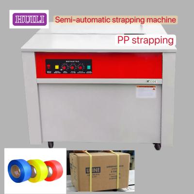 China Semi Auto Box Strapping Machine Single Phase 200V Carton Strapping Machine for sale