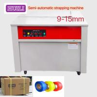 China 9mm-15mm Width Strap Semi Automatic Box Strapping Machine Flip Up Desktop Design for sale