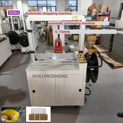 China 5-15mm automatic strapping machine automatic strapping machine Home appliance strapping machine for sale