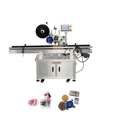 China Flat automatic Hand Label Dispenser Automatic  Labeling Dispenser Bottle Labeling Machine  Automatic for sale