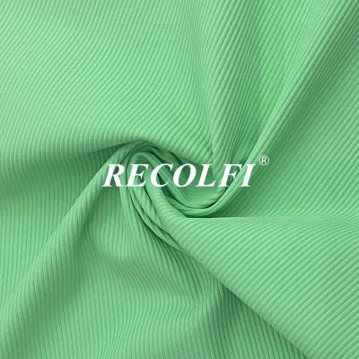 中国 EcoはリサイクルされたActivewearのニットの生地のデジタル印刷物のレギングのヨガの摩耗を肋骨で補強する 販売のため