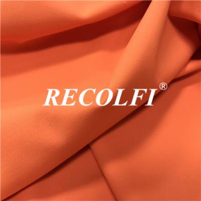 China Hoge Gerecycleerde Spandex de Stoffen Oranje Kleur van Upf Classificatie voor Uiteindelijke Activewear Te koop