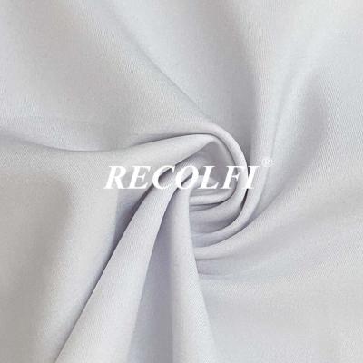 中国 伸縮性があるヤーンの混合されたActivewearのニットの生地の全体的なリサイクルされた標準の循環の摩耗 販売のため