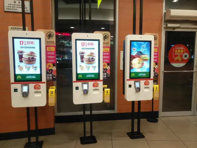 32-inch payment kiosk in use
