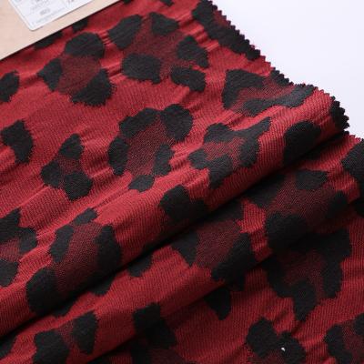China Nrtsp Warp Stretch Bengaline Fabric with Snake Skin Design for Holiday Garment for sale