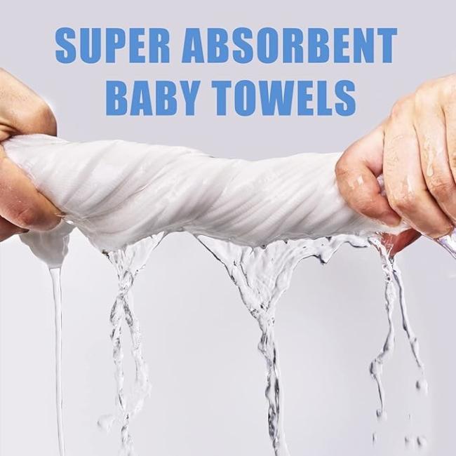 Large 40x40 inch baby towel being used to wrap an infant
