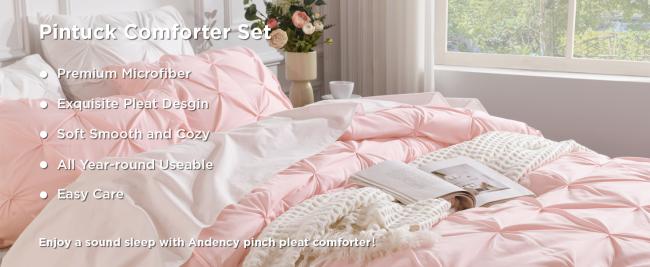 Complete pink comforter set on a beautifully made bed