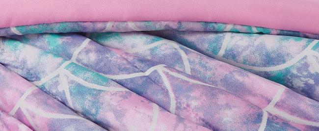 Close-up showing the soft texture of the comforter fabric