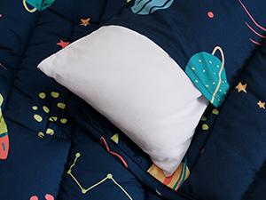 Child sleeping comfortably on nap mat