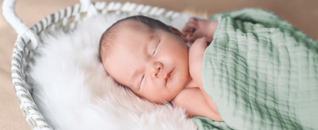 Close-up showing the soft texture of the muslin cotton baby towel