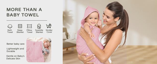 Baby using towel as swaddle blanket