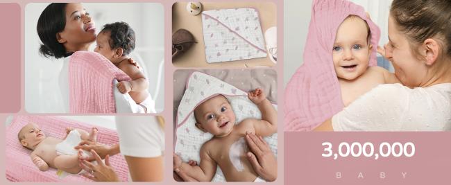 Gift-wrapped baby towel set with ribbon