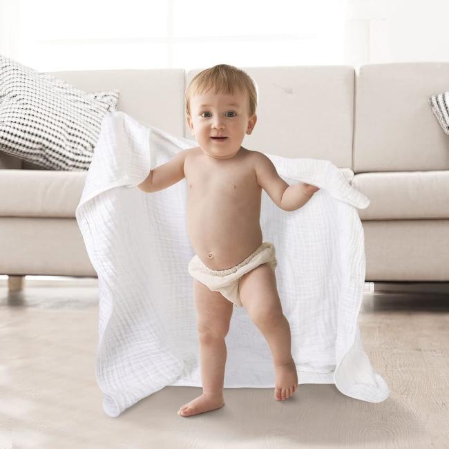 Baby towel being used as a swaddle blanket
