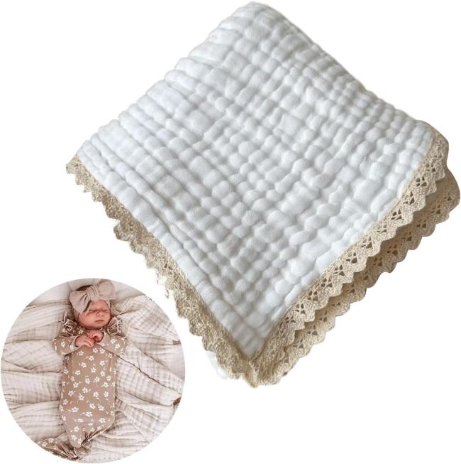 Soft cotton gauze blanket in beige color showing texture and fold