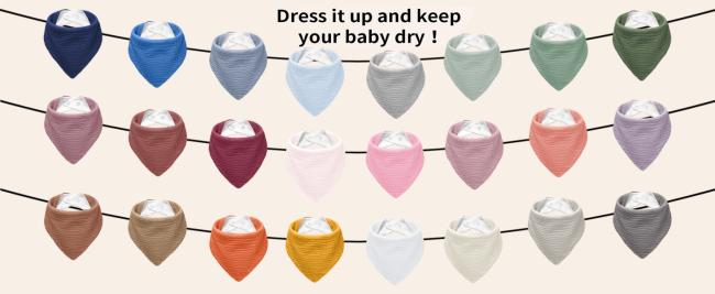 Assortment of colorful baby bibs