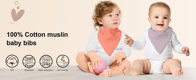 Set of colorful muslin baby bibs displayed together