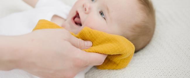 Close-up of packaged baby bib set