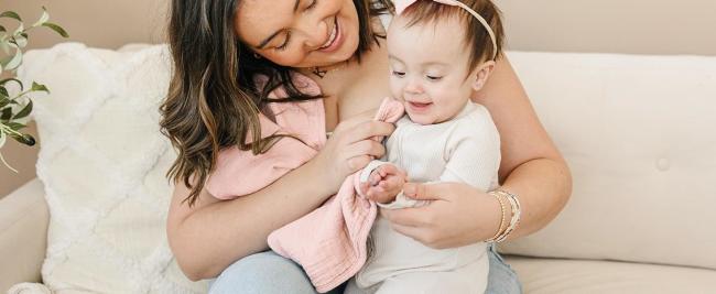 Burp cloth being used as a bib during feeding