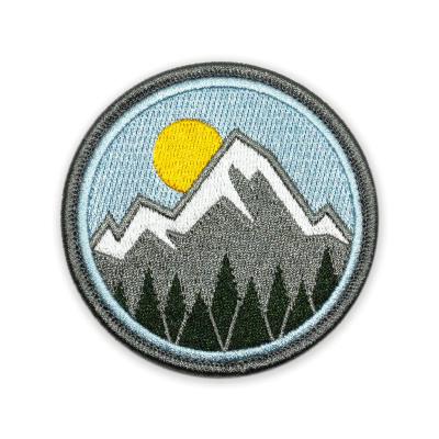 Cina La vita in montagna, l'icona morale, il ferro ricamato sulle patch per le uniformi militari in vendita