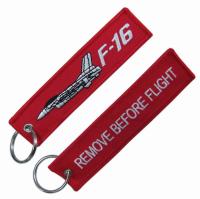 China Custom Embroidered Twill Keychain Remove Before Flight Key Tag 130x30mm for sale