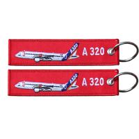 China Custom Embroidered Twill Keychain Remove Before Flight Key Tag 130x30mm for sale