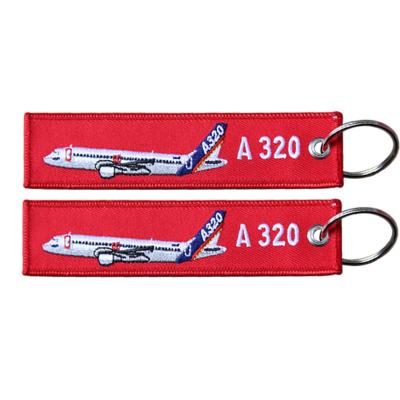 Cina Il pilota della saia rimuove prima di forma e di colori su misura Keychain di volo in vendita