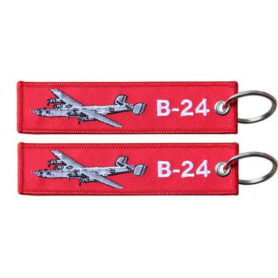 Cina Il pilota della saia rimuove prima di forma e di colori su misura Keychain di volo in vendita