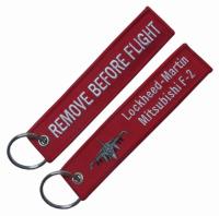 China Custom Embroidered Remove Before Flight Keychain 130x30mm PMS Merrow Border for sale