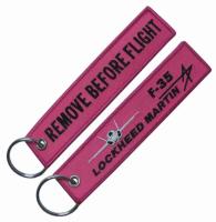 China Custom Embroidered Remove Before Flight Keychain 130x30mm PMS Merrow Border for sale