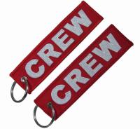 China Custom Double Sided Remove Before Flight Keychain Twill Embroidery Textile 100 Pcs MOQ for sale