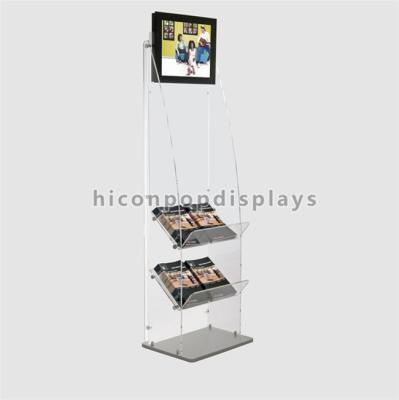 China Book Retail Store Fixtures Clear Acrylic Floor Display Stand With Lcd Screen for sale