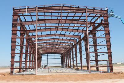 China Prefabricated Steel Structure Warehouse With Sandwich Panel Glass Wool Roof Cladding And Q235/Q345 Steel Building Kits for sale