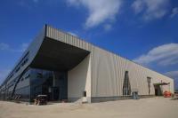 China Curtain Wall Designed Pre-engineered Steel Frame Modern Prefab Workshop Building for sale