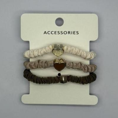 China Meerdere kleuren Stijlvolle elastische haarbanden met hart voor eindeloze styling opties Te koop